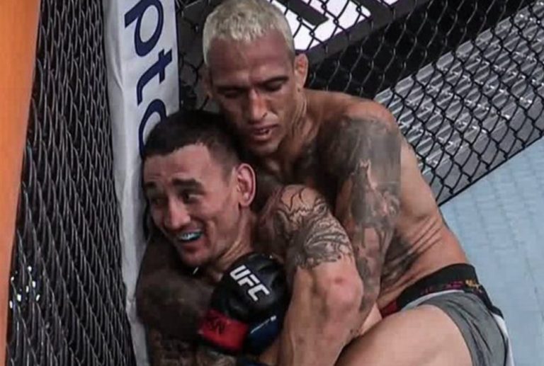 Pros react after Charles Oliveira defeats Max Holloway at UFC 326 ...