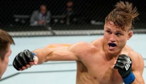 Drew Dober reacts after "Fight of the Night" defeat to Brad Riddell at ...